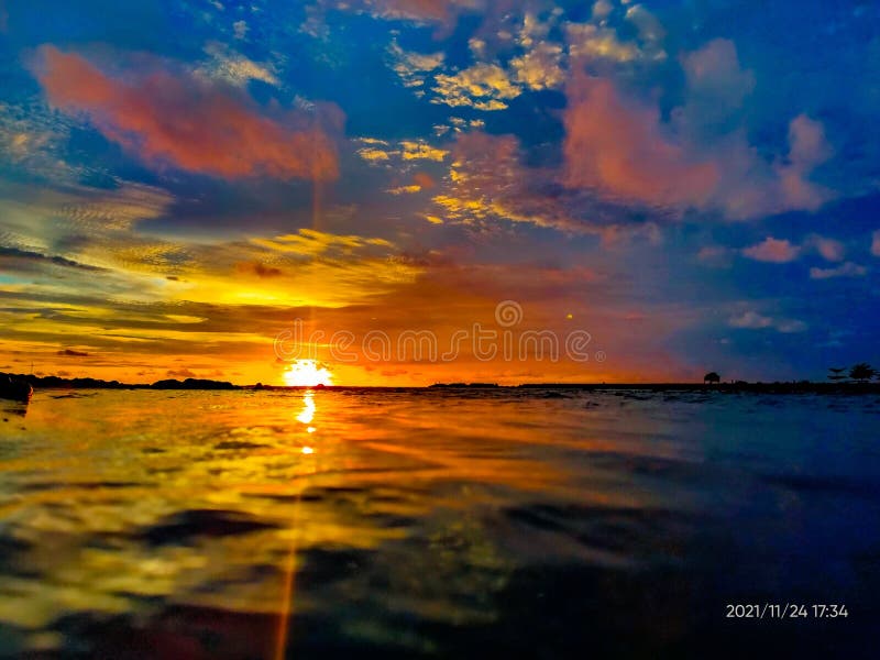 What a Cute Sunset beach stock photo. Image of beach - 244317026