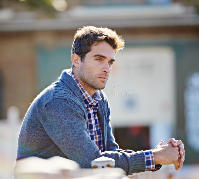 What Does it All Mean. a Handsome Young Man Leaning Over a Railing ... What Does it All Mean. a Handsome Young Man Leaning Over a Railing ...