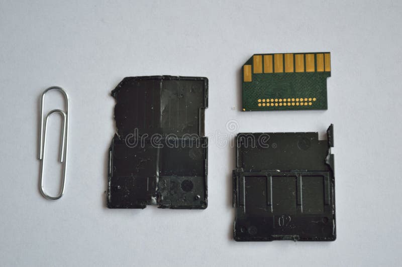 Inside an SD Card with Paperclip Scale Measure Stock Photo - Image of ...