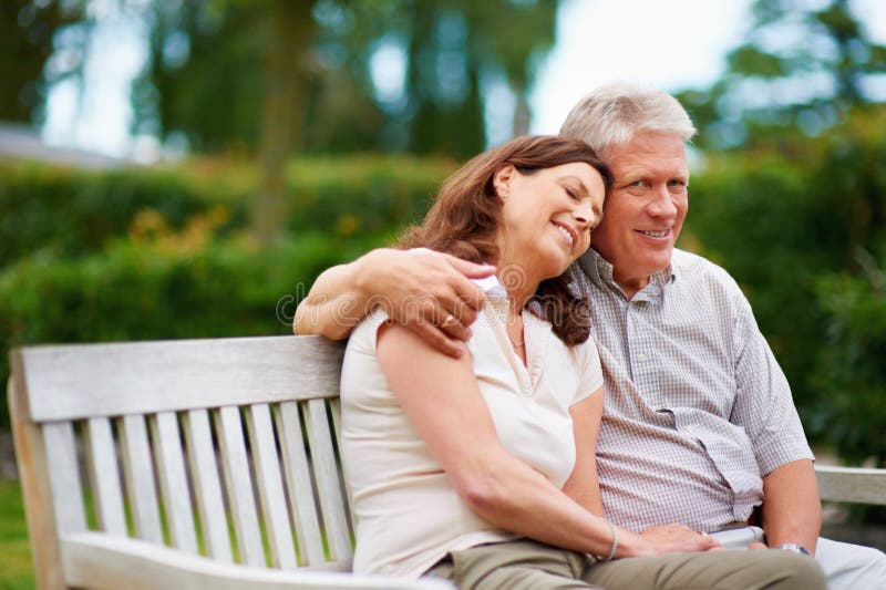What a Lovely Day. a Couple on a Bench Outdoors. Stock Photo - Image of ...