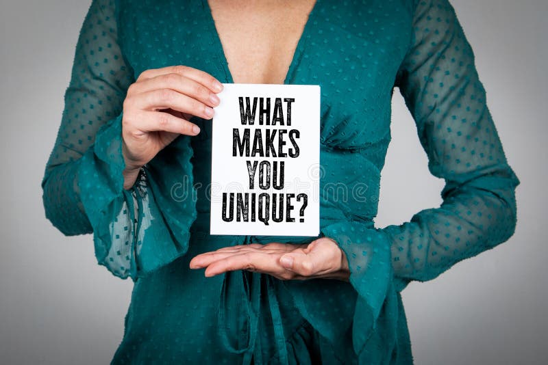 What Makes You Unique. Woman Holding a Notepad Stock Photo - Image of ...