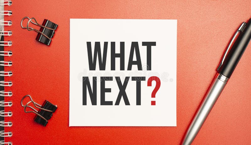 WHAT NEXT Sign on Sheet of Paper on the Red Notepad with Pen Stock ...