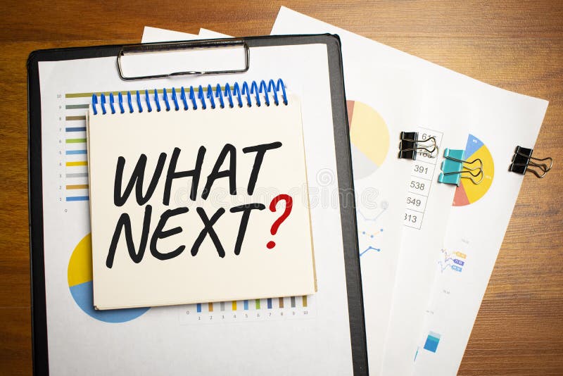 WHAT NEXT is Written on a Notepad on an Office Desk Stock Photo - Image ...