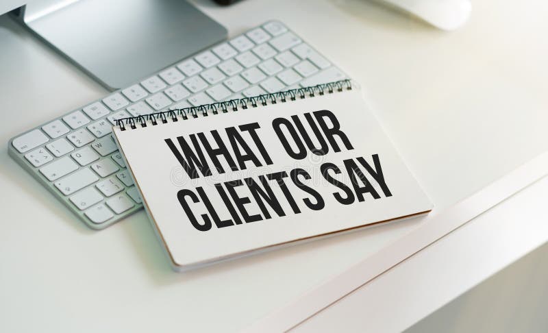 What Our Clients Say Statement on Notepad on Office Desk Stock Photo ...