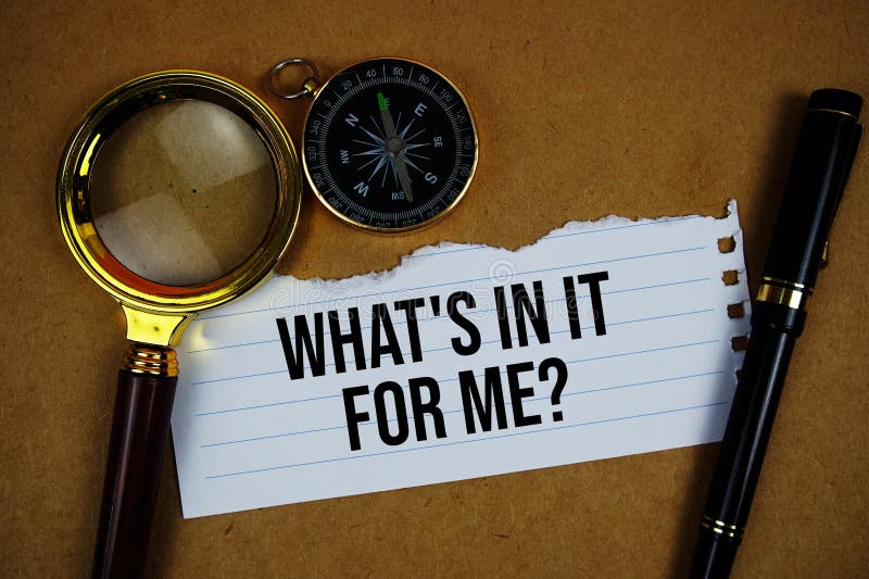 What S in it for Me? Text on Paper Torn with Compass and Magnifying ...