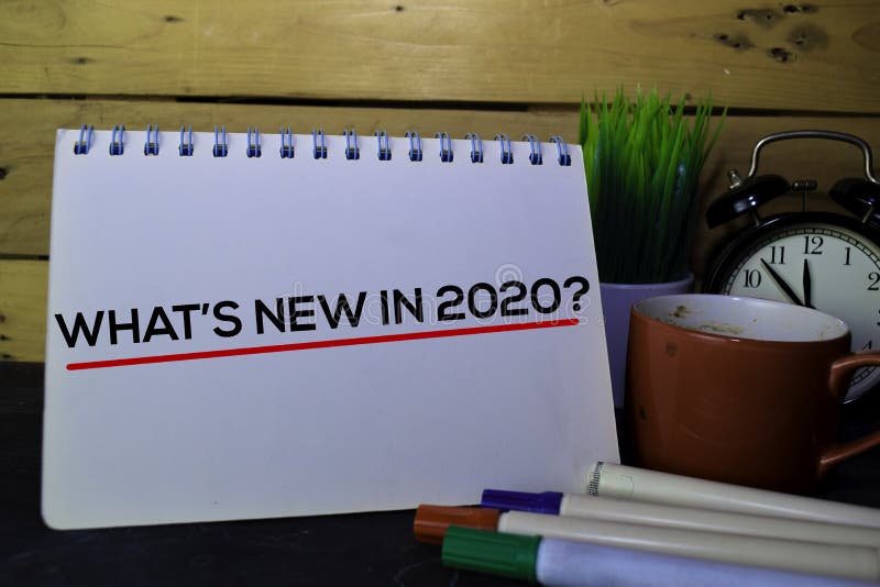 What`s New in 2020? Write on Book Isolated on Wooden Table Stock Photo ...