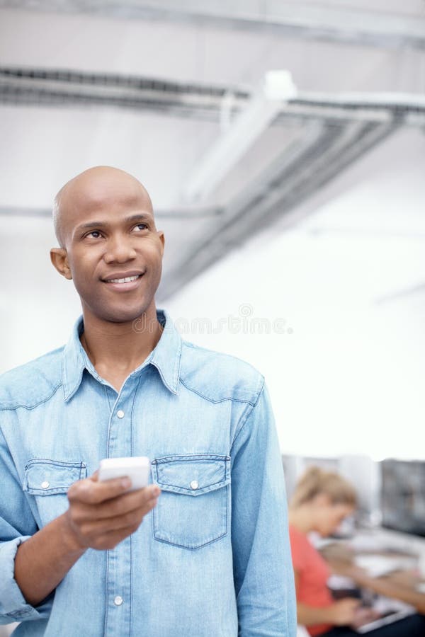 What Should I Say. a Young Businessman Sending a Text Message in the ... What Should I Say. a Young Businessman Sending a Text Message in the ...