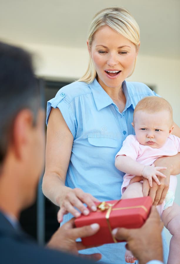 What a Surprise. a Man Surprising His Wife with a Gift. Stock Photo ...