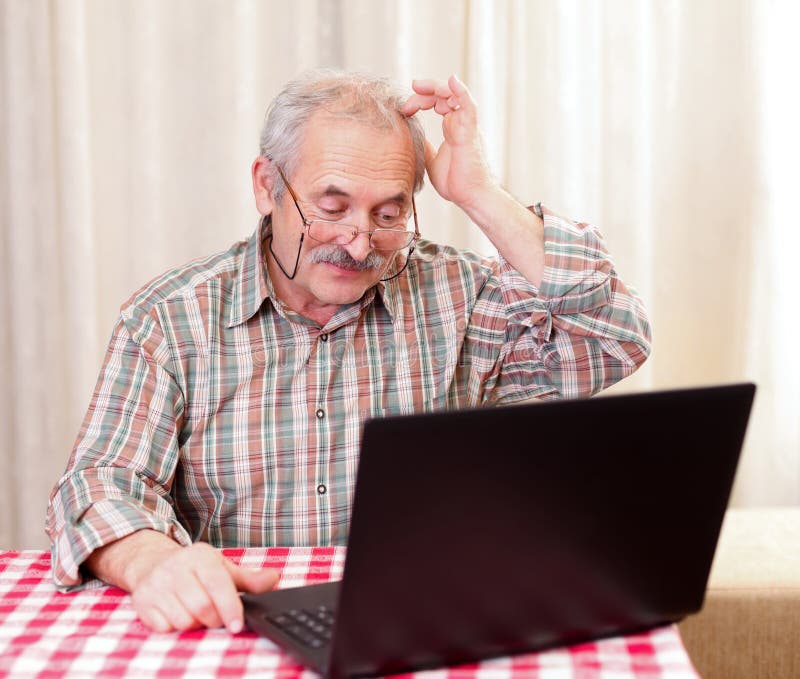 Woman Teaching Confused Elderly Man How To Use Laptop Stock Image ...