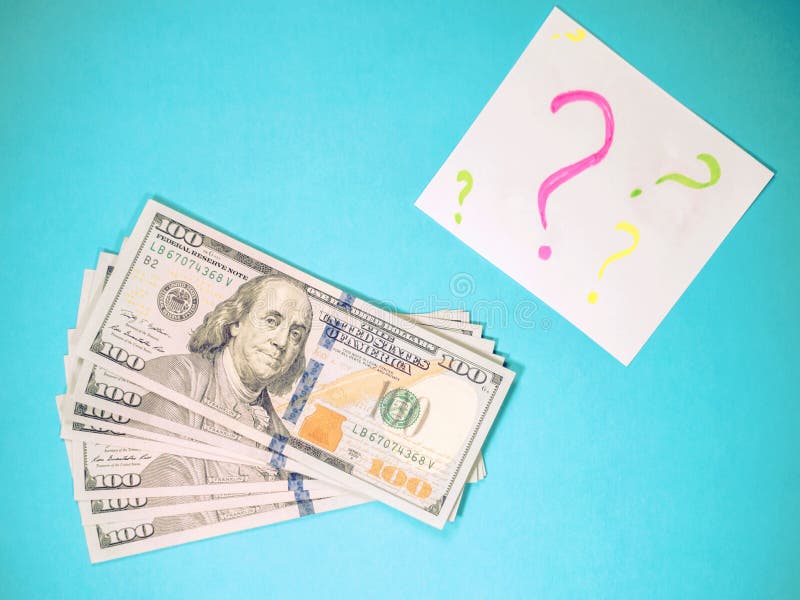 On What To Spend Earned Money, Dollars, White Paper with Question Marks ...