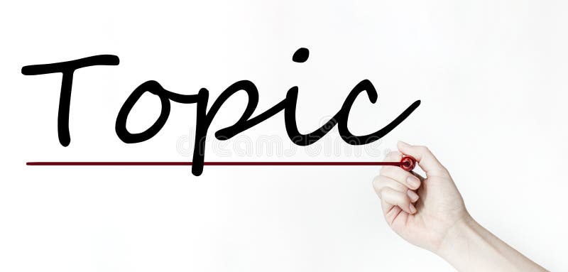 The Word TOPIC is Written on Wooden Cubes. Wooden Cubes on a Green Lawn ...