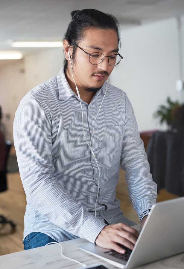 Whatever You Need To Do To Win, Do it. a Young Businessman Using a ...