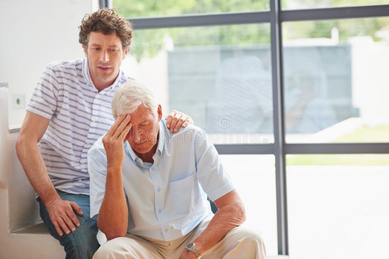Whats the Matter, Dad. a Man Offering Support To His Father. Stock ...