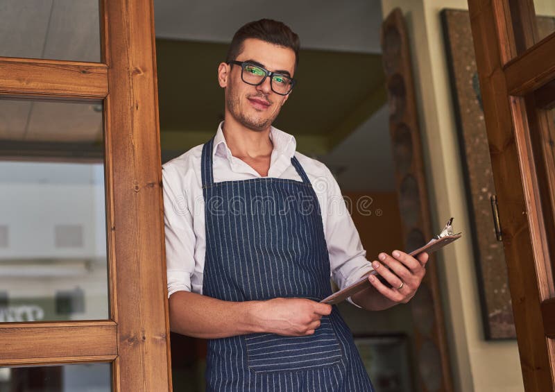 Whats on the Menu Today. a Man Working at a Restaurant. Stock Photo ...