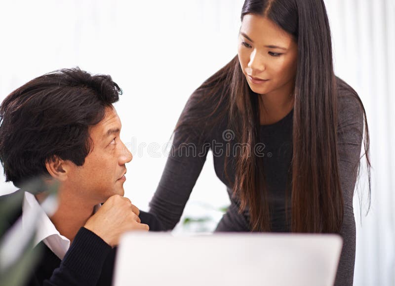 Whats the Next Step. Two Business Colleagues Discussing Work in the ...