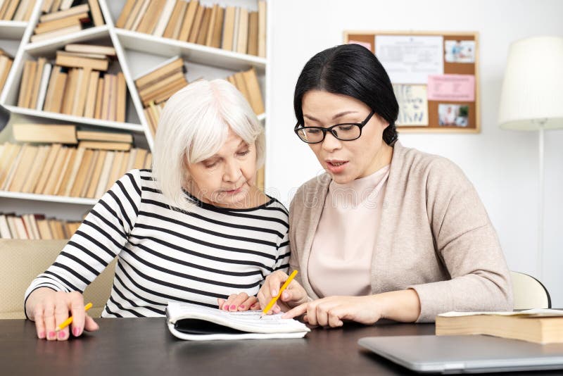 Concentrated Senior Tutor Verifying Task Stock Photo - Image of ...