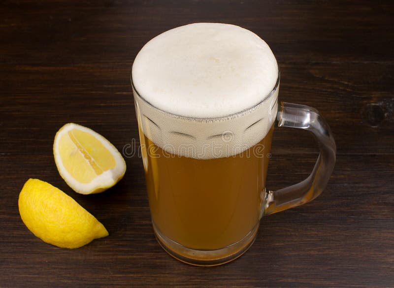 Wheat beer and lemon stock photo. Image of pint, shadow - 45660952