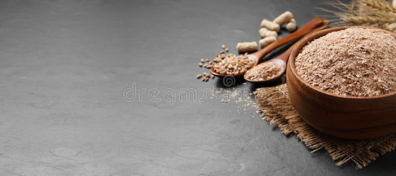 Wheat Bran in Bowl on Black Table. Space for Text Stock Photo - Image ...