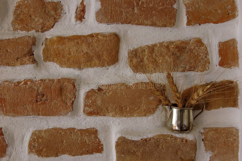 Wheat on the brick wall stock image. Image of texture - 74753583