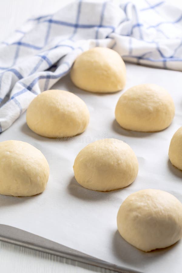 Wheat Buns Rising on a Baking Sheet Stock Image - Image of culinary ...