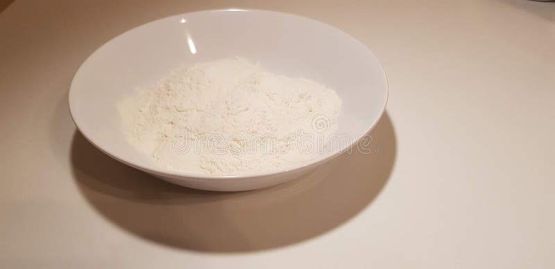 Wheat Flour on a White Plate on the Table Stock Image - Image of food ...