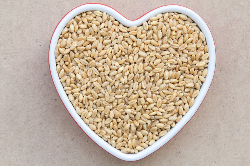 Wheat Grain in Heart Shaped Porcelain Dish Stock Image - Image of ...