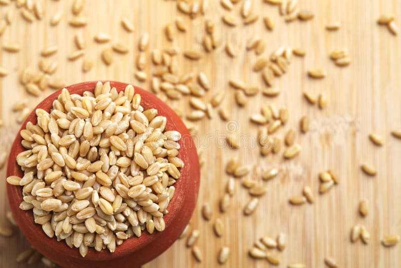 Wheat Grains in Clay Pot on White Background Stock Photo - Image of ...
