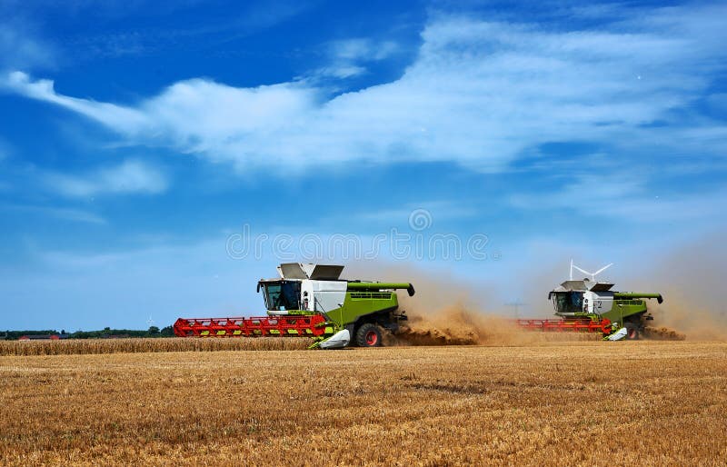 Wheat Harvester Machine at Work on Field Stock Photo - Image of crop ...