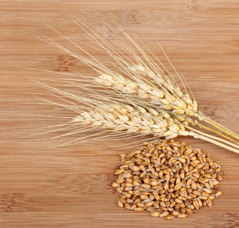 Wheat Heads And Wheat Grain Royalty Free Stock Images - Image: 20243909