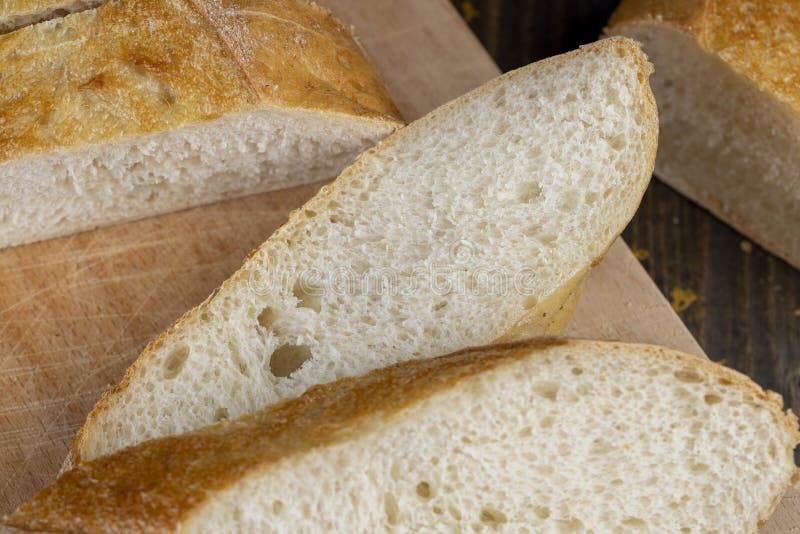 Wheat Loaf of Bread Close-up on the Table Stock Photo - Image of brown ...