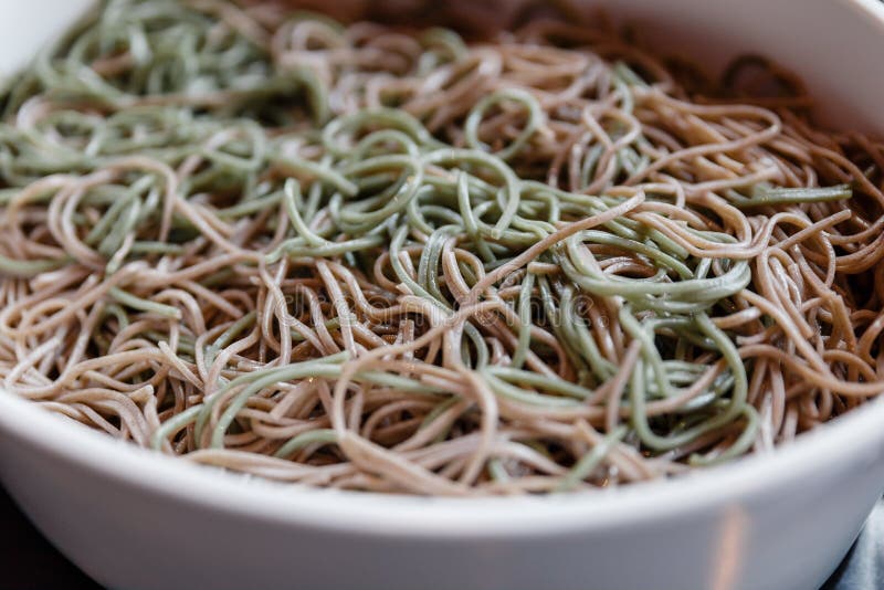 Wheat Noodle Green and Brown Color in the White Bowl Stock Photo ...