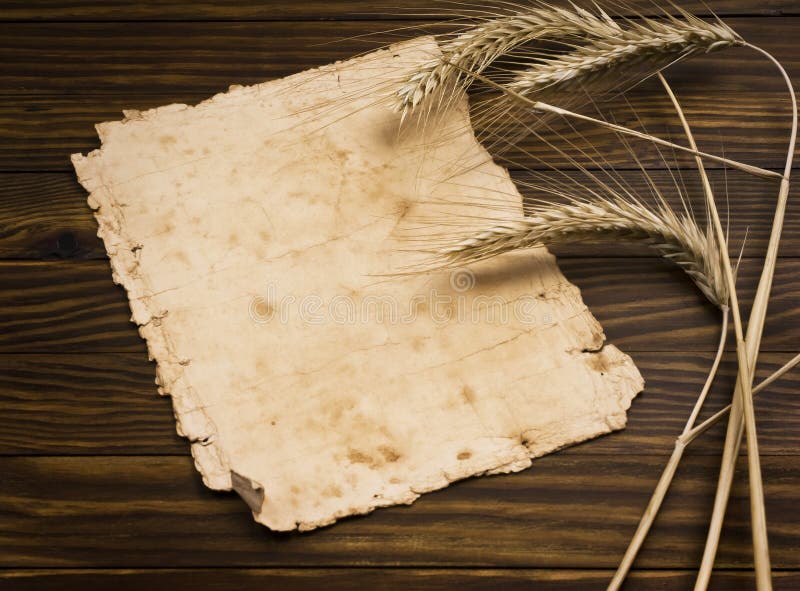 Wheat on the Old Wooden Table and Old Paper Stock Photo - Image of ...