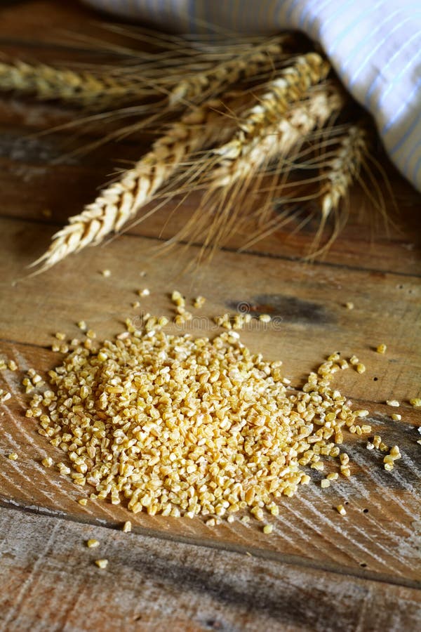 Wheat and Wheat Grains on Wooden Table. Stock Image - Image of healthy ...