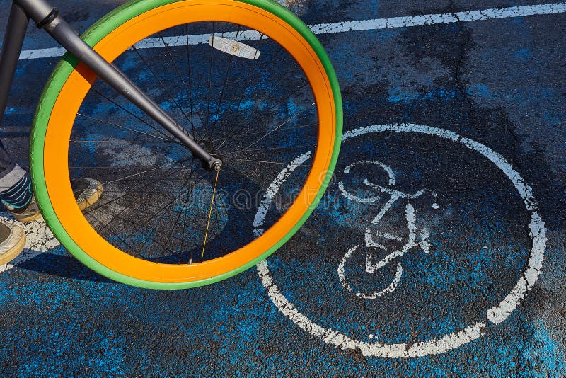 The Wheel of a Bicycle and a Sign of a Bicycle Path Stock Image - Image ...