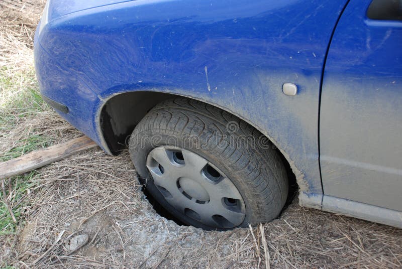 The Car with the Wheel in the Pit Stock Photo - Image of drive ...