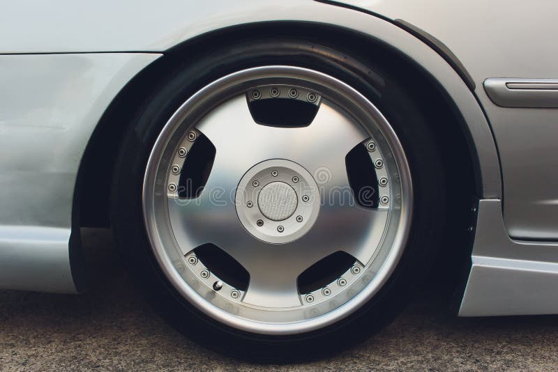 The Wheel of a Car with a Cast Disk. Stock Image - Image of metal ...