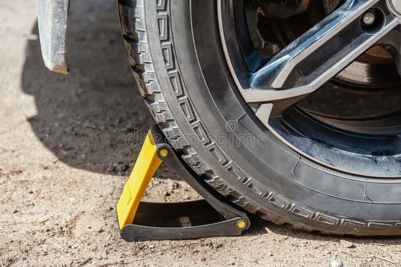 Wheel Chocks for Restricting Movement Under the Wheel of the Car ...