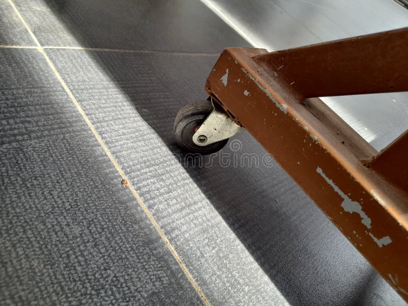 The Wheel of the Clothesline on the Floor Stock Photo - Image of ...