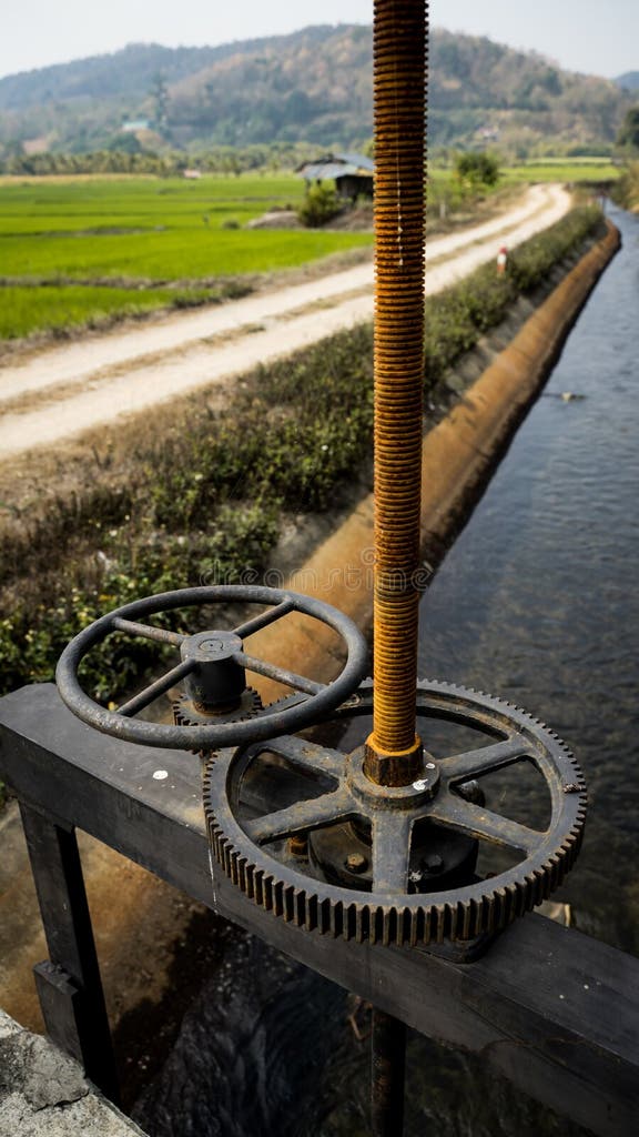 Wheel on dam stock photo. Image of factory, sluice, valve - 175487510