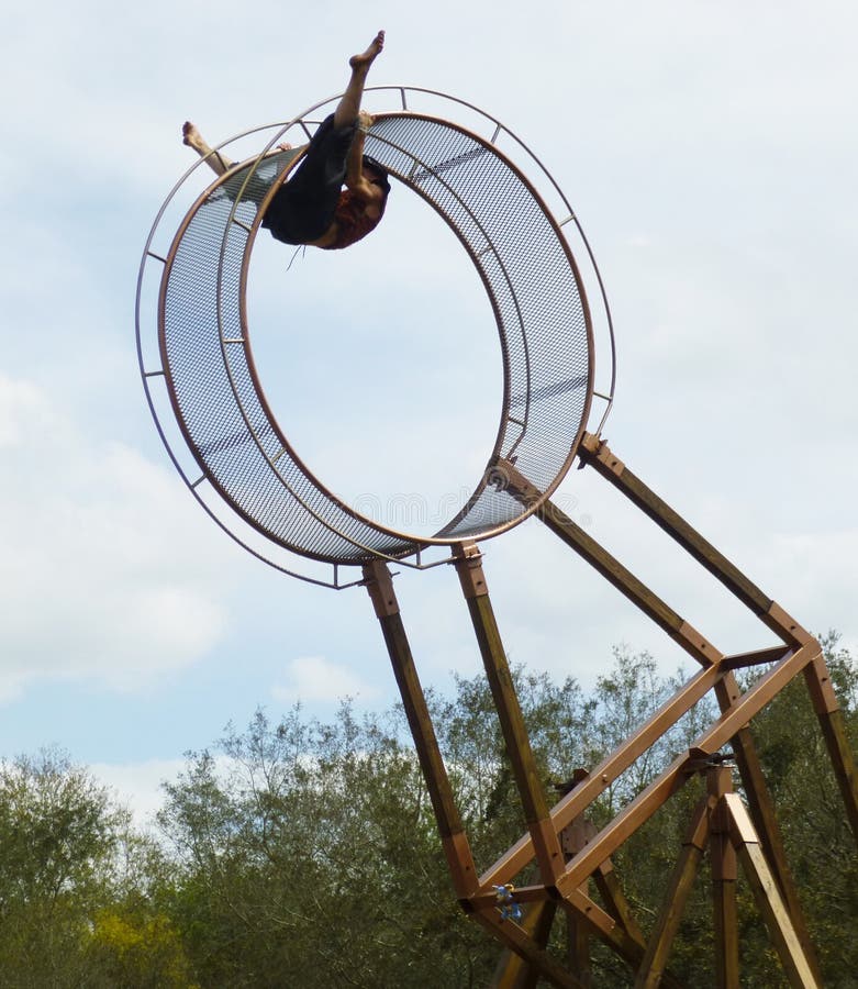 Wheel of death performer editorial photography. Image of gold - 68765447