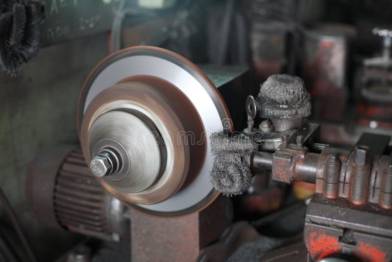 Wheel Disc Brake Fixed by Mechanic Machine in Garage Stock Image ...