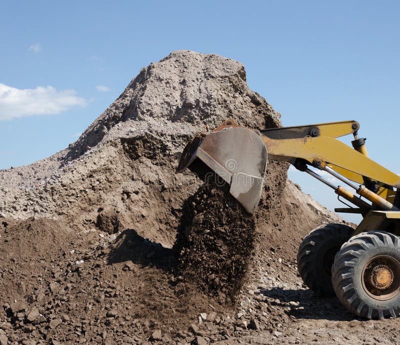 Wheel Excavator Digging Gravel Pile Stock Image - Image of construction ...