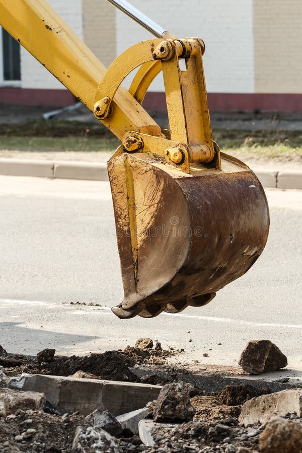 Wheel Excavator Digging Trench on Rocky Land Stock Photo - Image of ...