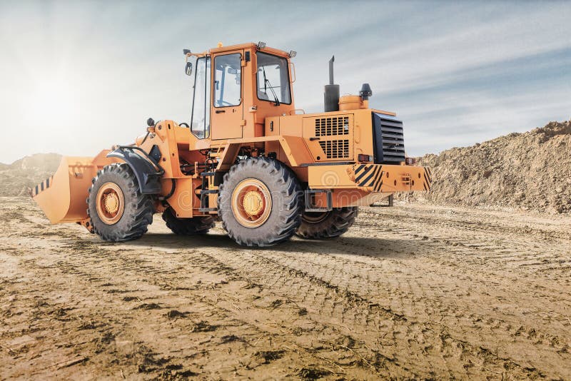 Wheel Front Loader or Bulldozer at a Construction Site in a Quarry ...