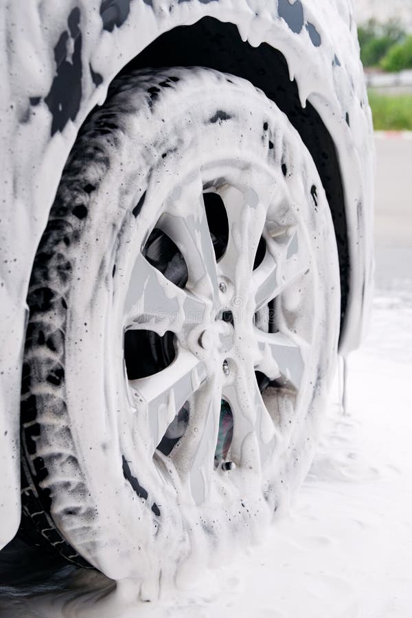 Car Wheel in Foam and Detergent Bubbles at the Sink Stock Image - Image ...