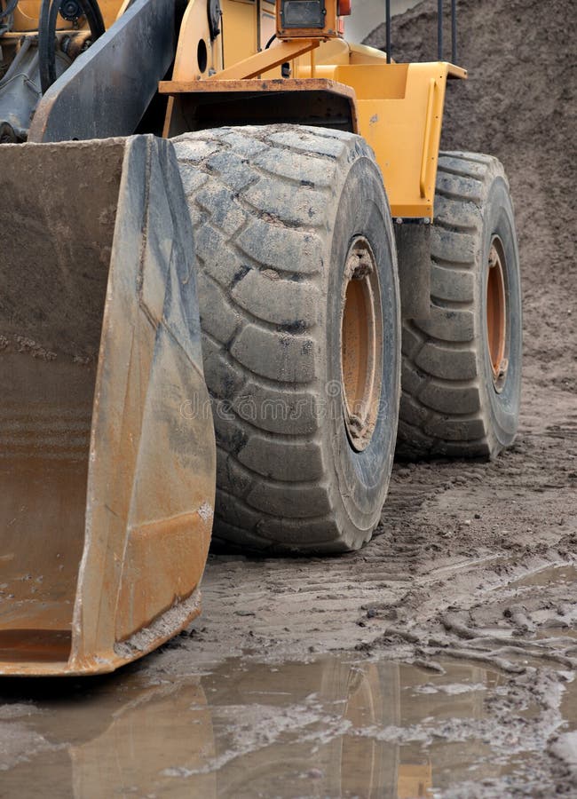 Wheel of heavy digger stock image. Image of site, clay - 27898143