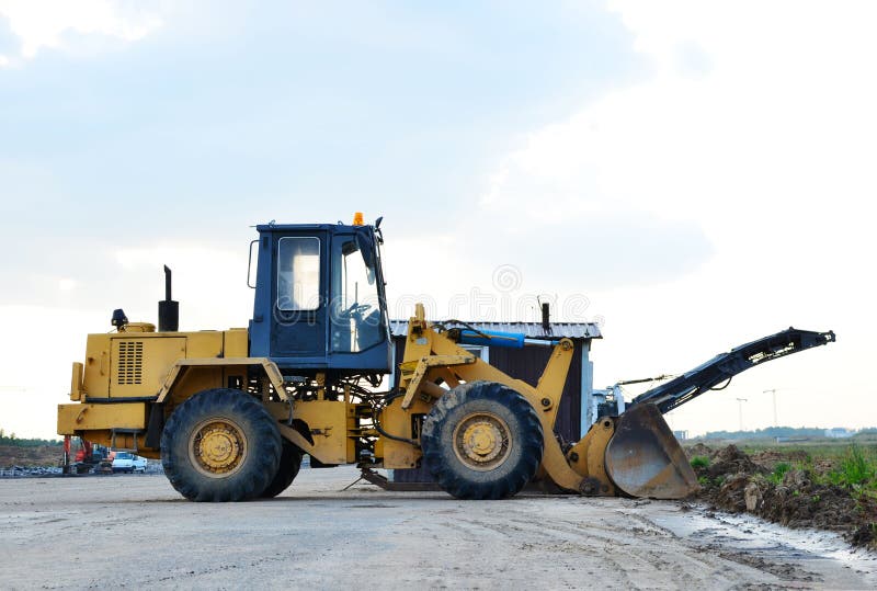Wheel Loader Bulldozer with Bucket on a Construction Site Stock Photo ...
