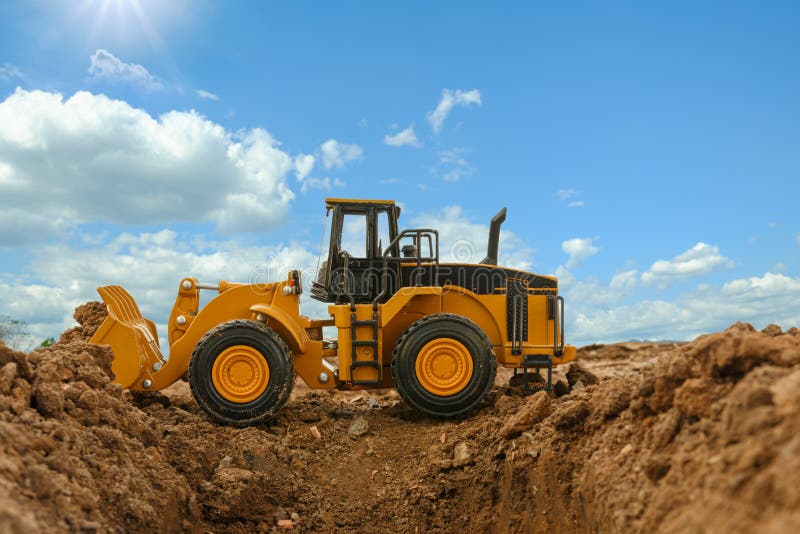 Wheel Loader are Digging the Soil in the Construction Site . Stock ...