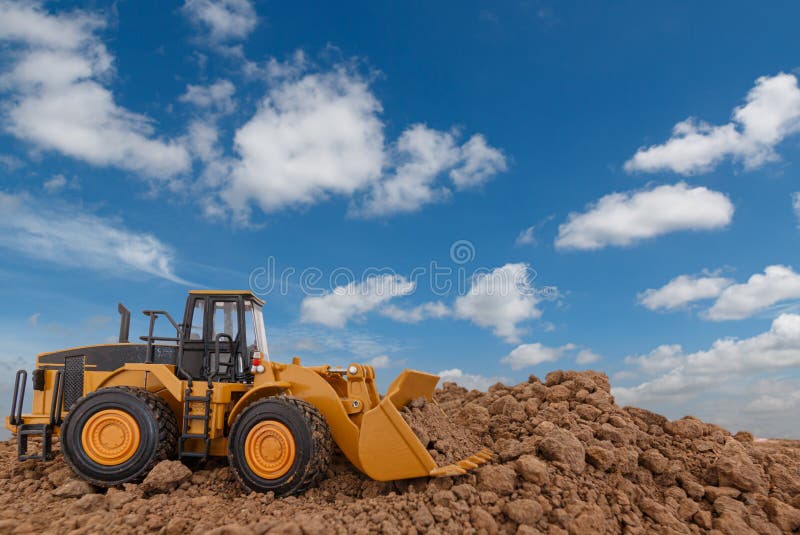 Wheel Loader are Digging the Soil in the Construction Site . Stock ...
