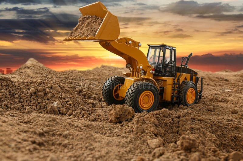 Wheel Loader are Digging the Soil in the Construction Site . Stock ...